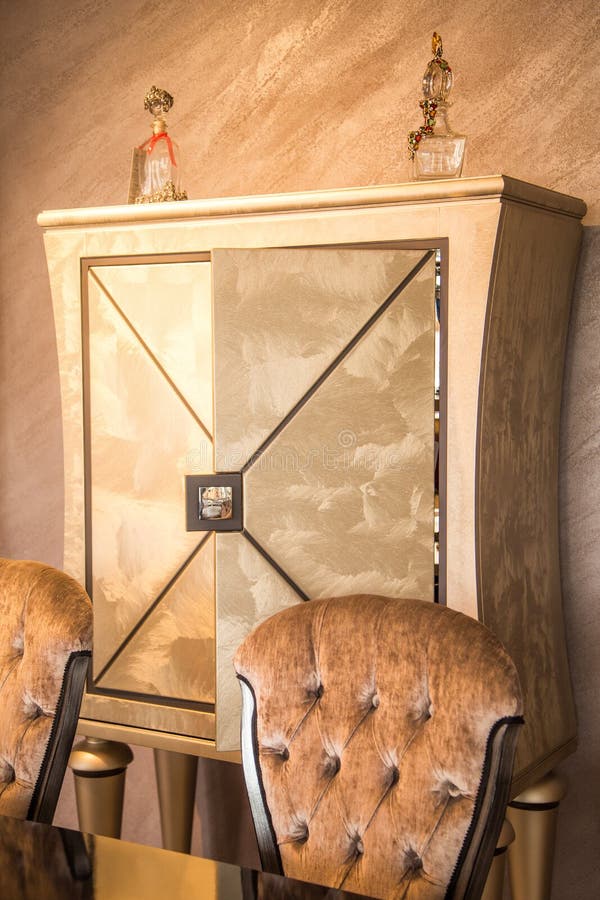 Part Luxurious Interior. Golden Locker and Chairs Stock Photo - Image ...