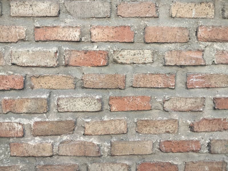 Solid Brick Wall with Variegated Red Color As a Background Stock Photo ...