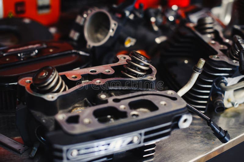 Part of a Motorcycle Engine on a Table in a Workshop Stock Photo ...