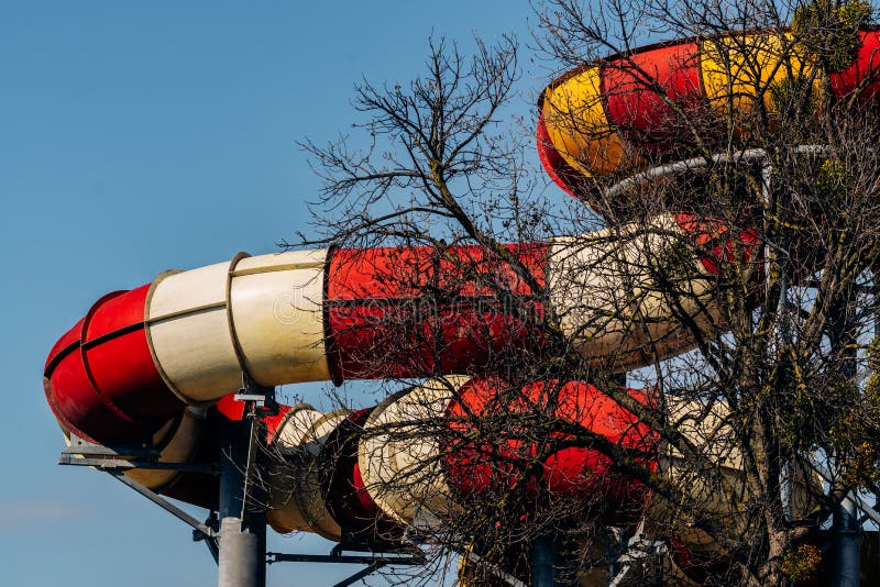 Part of a Multi-colored Large Pipe Slide in a Water Park Against a Blue ...