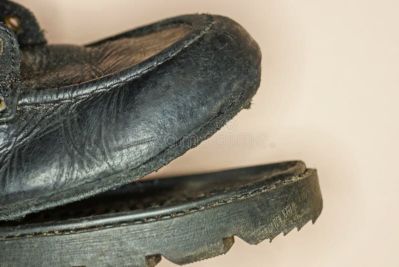 Part of an Old Black Leather Boot with a Torn Off Sole Stock Photo ...