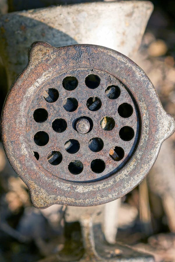 Part of an Old Gray Iron Grinder in Rust Stock Image - Image of hole ...