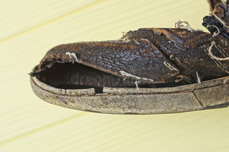 Part on a One Old Brown Torn Boot Stock Image - Image of hole, clothing ...