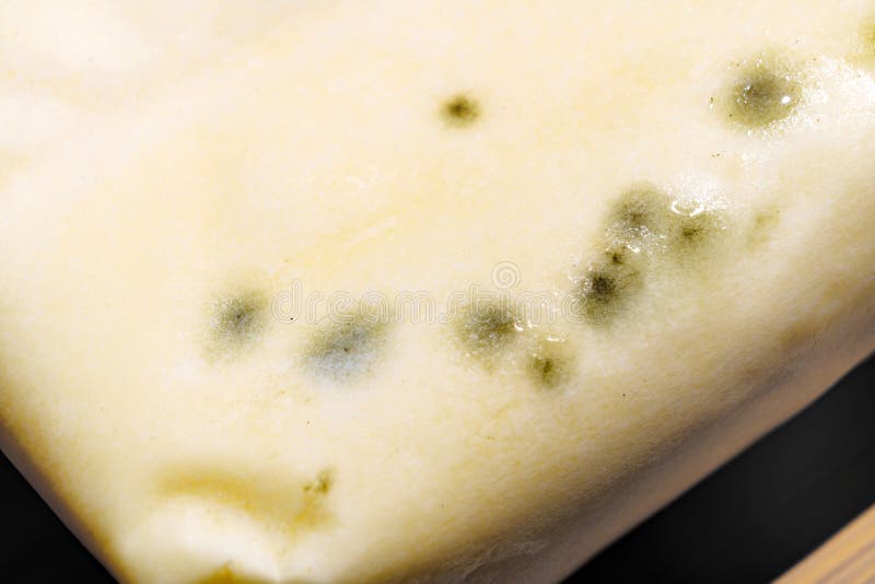 Part of a Pack of Spoiled Butter with Mold. the Storage of Dairy ...