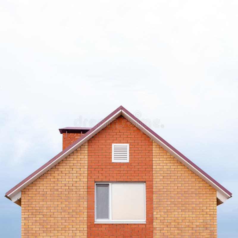 Part of a Red Brick Private Building Against a Clear Sky. Triangular ...
