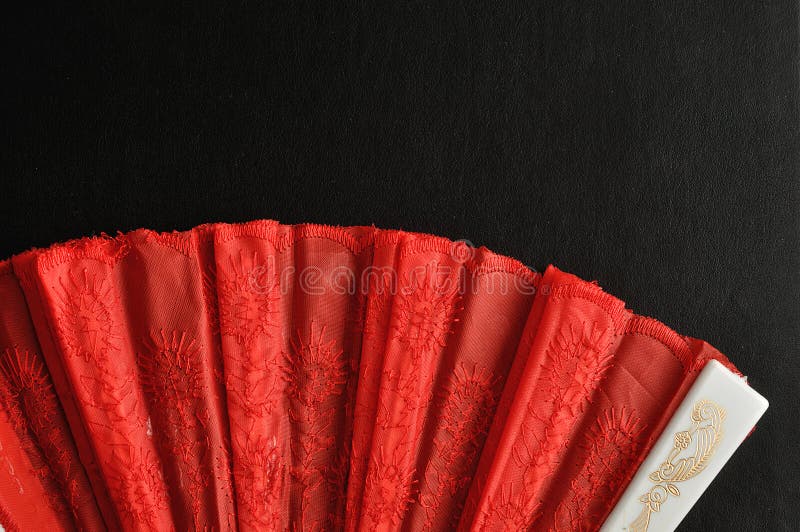 Part of a red hand fan stock photo. Image of white, cooling - 80349840