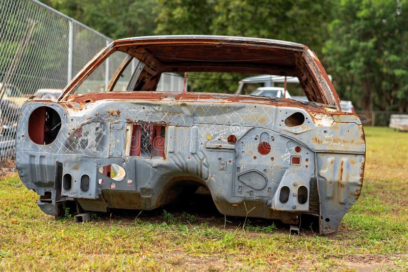 Rusted Frame of a Classic Car Stock Photo - Image of abandoned ...