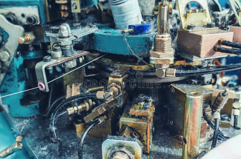 Part of Sock Knitting Machine in Operation. Dust from Threads ...