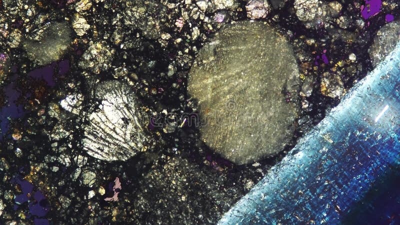 Part of a Space Meteorite Under a Microscope Closeup Stock Photo ...