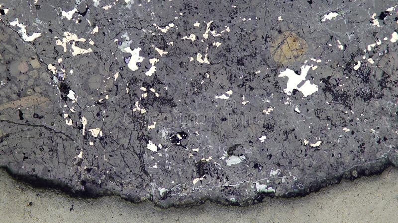 Part of a Space Meteorite Under a Microscope Closeup Stock Photo ...