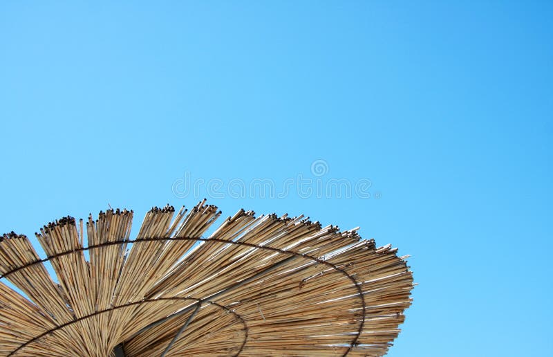 Part of straw parasol stock photo. Image of protect, blue - 29583994