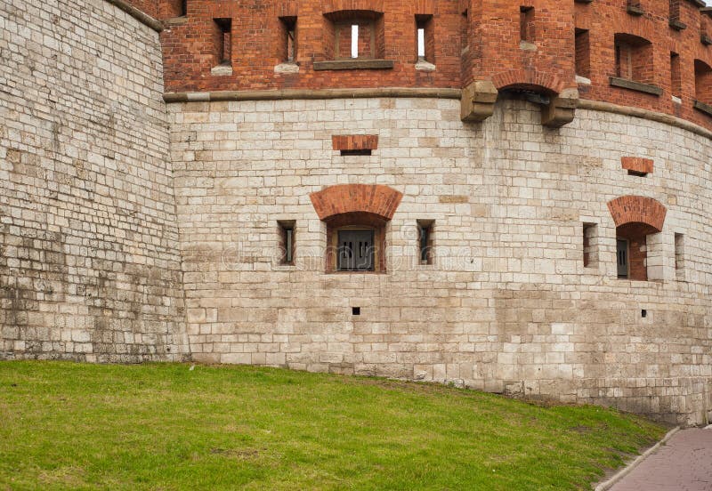Part of the Wall of an Ancient Castle with Windows with Bars. Stock ...