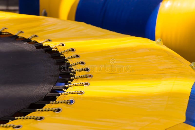 Part of yellow trampoline stock photo. Image of color - 30891362