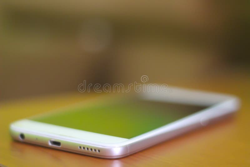 Phone Side View on the Brown Table Stock Image - Image of design ...
