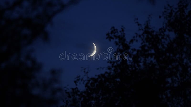 Partial Moon stock photo. Image of dark, night, clouds - 99677338