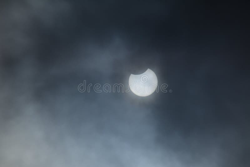 Partial Solar Eclipse with Clouds Stock Photo - Image of natural, white ...