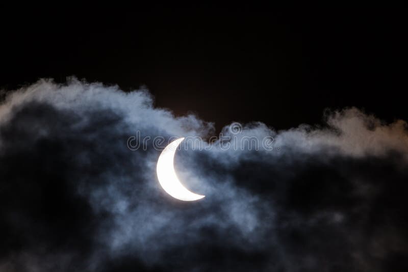 Partial Solar Eclipse through Clouds Stock Image - Image of astronomy ...