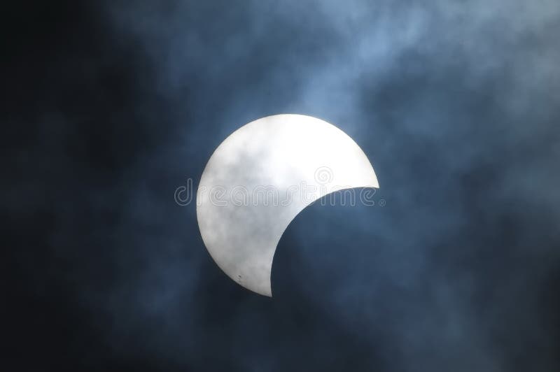 Partial solar eclipse stock photo. Image of clouds, space - 17710894