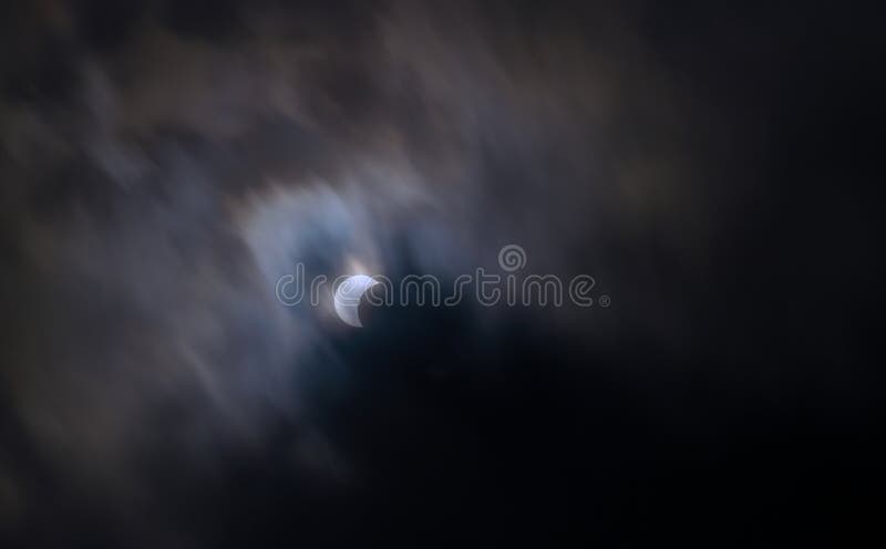 Partial Solar Eclipse on a Cloudy Day Stock Image - Image of america ...