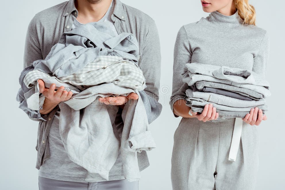 Partial View of Couple Holding Grey Clothes Isolated Stock Image ...