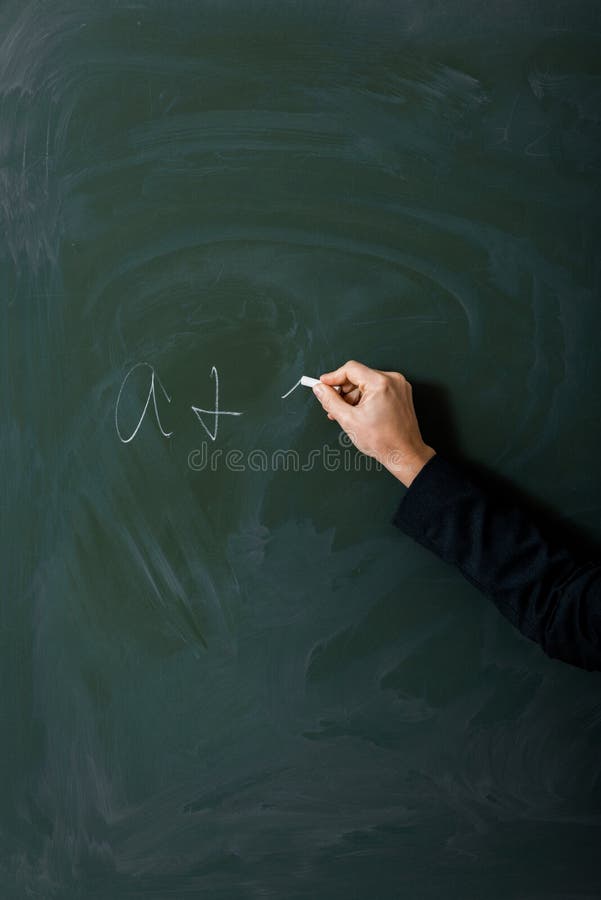Partial View of Female Teacher Writing Equation Stock Image - Image of ...