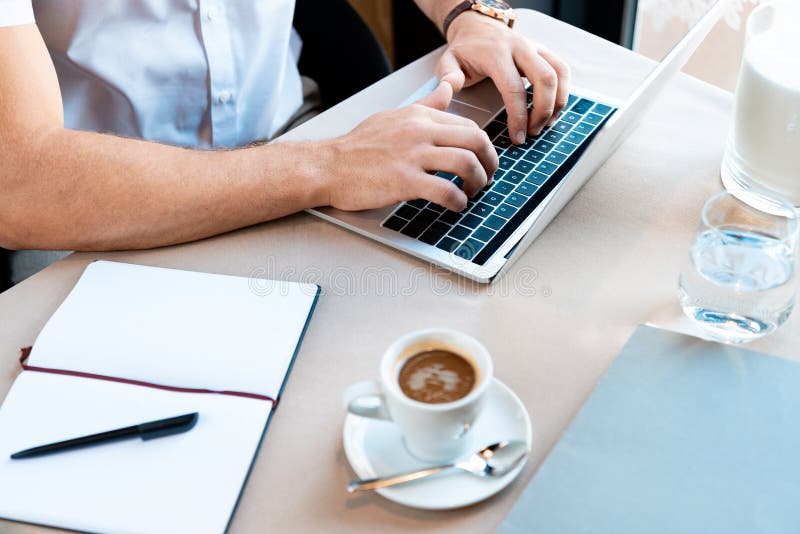 View of Freelancer Typing on Laptop Keyboard in Cafe Stock Photo ...