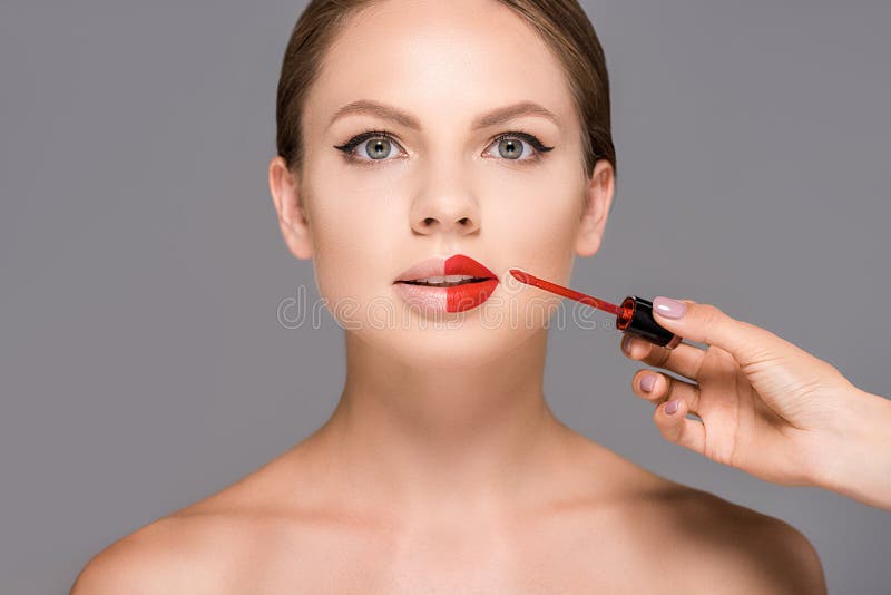 Partial View of Makeup Artist Applying Red Lipstick on Models Lips ...