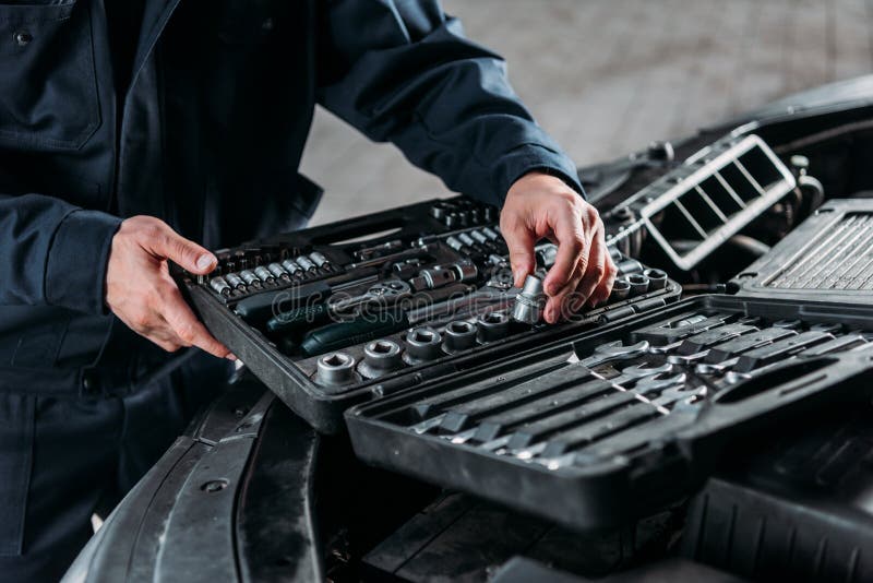 Partial View of Mechanic with Tool Case in Auto Stock Image - Image of ...