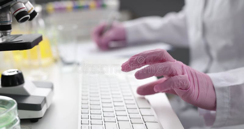 Partial View of Scientist Typing on Computer Keyboard in Laboratory ...