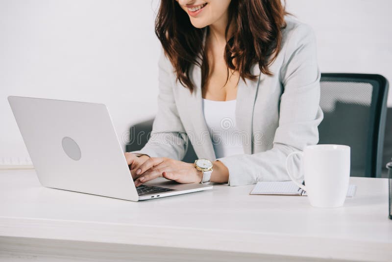 Partial View of Smiling Secretary Using Stock Image - Image of gadget ...