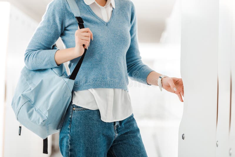View of Student with Backpack Opening Locker Stock Photo - Image of ...