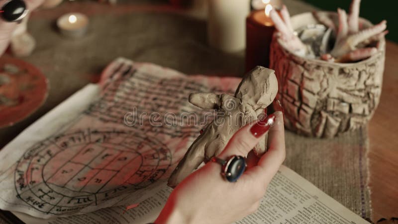 Partial View of Witch Putting Needle in Voodoo Doll while Practicing ...