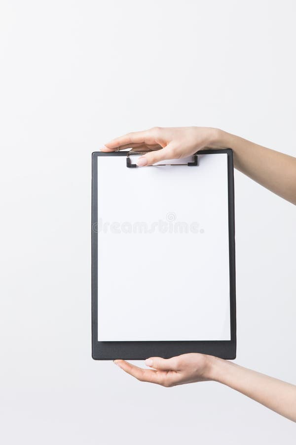 Partial View of Woman Holding Blank Clipboard in Hands on White Stock ... Partial View of Woman Holding Blank Clipboard in Hands on White Stock ...