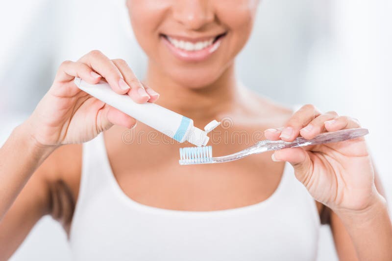 Partial View of Young Woman Putting Toothpaste Stock Image - Image of ...