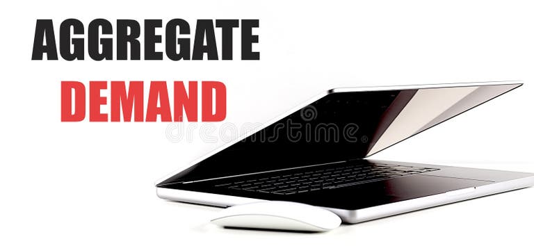 Partially Closed Laptop with a Computer Mouse on a White Desk and the ...