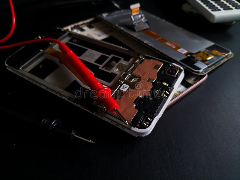 Repair of a Mobile Phone on Black Background Stock Image - Image of ...