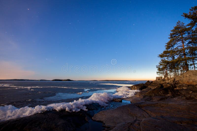 Partially Melting Ice in Lake at Night Stock Photo - Image of ...