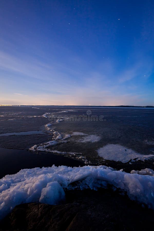 Partially Melting Ice in Lake at Night Stock Image - Image of melting ...
