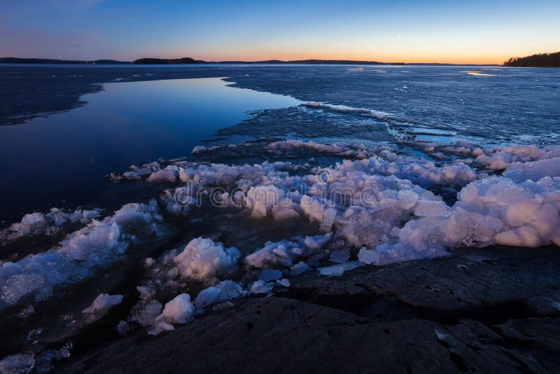 Partially Melting Ice in Lake at Night Stock Photo - Image of ...