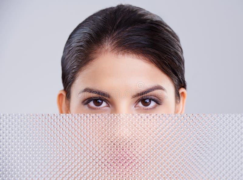 Partially Obscured Beauty A Beautiful Young Woman With Her Face Partially Obscured Through A