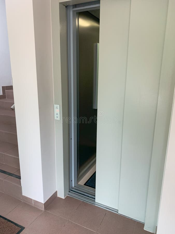 Partially Open Elevator Door in Building Stock Photo - Image of door ...