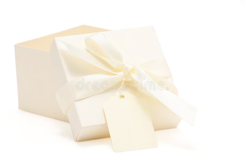 Cream Colored Gift Box with Bow and Name Tag Stock Image - Image of ...