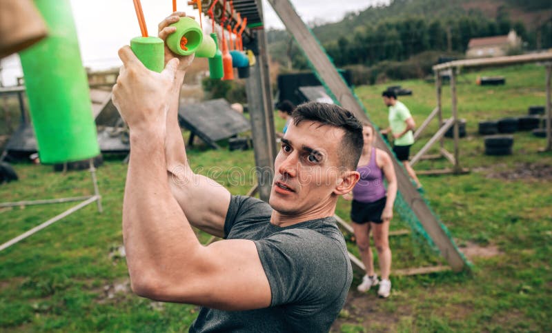 Participant Obstacle Course Doing Suspension Stock Image - Image of ...