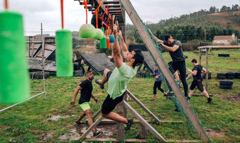 Participant Obstacle Course Doing Suspension Stock Photo - Image of ...
