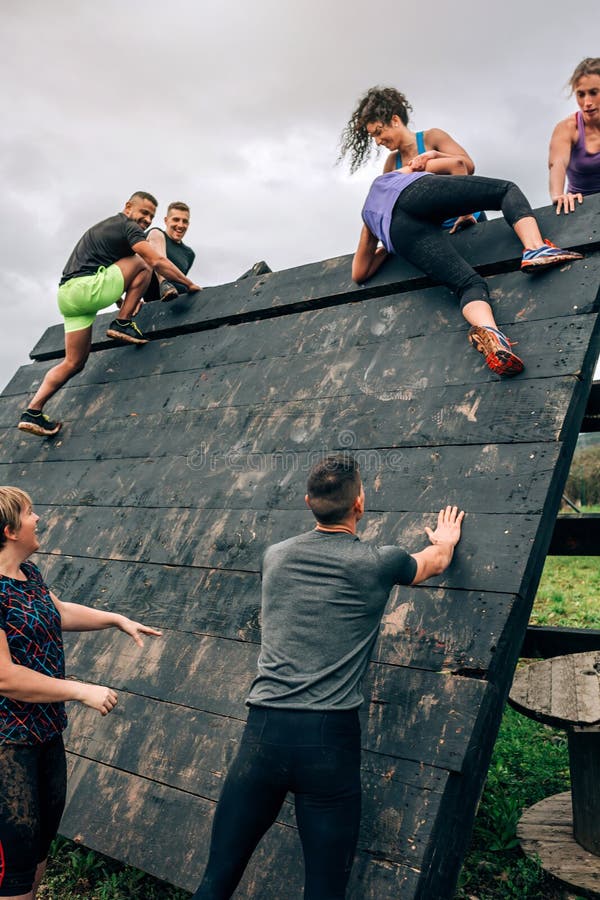 Participants in Obstacle Course Climbing Pyramid Obstacle Stock Photo ...