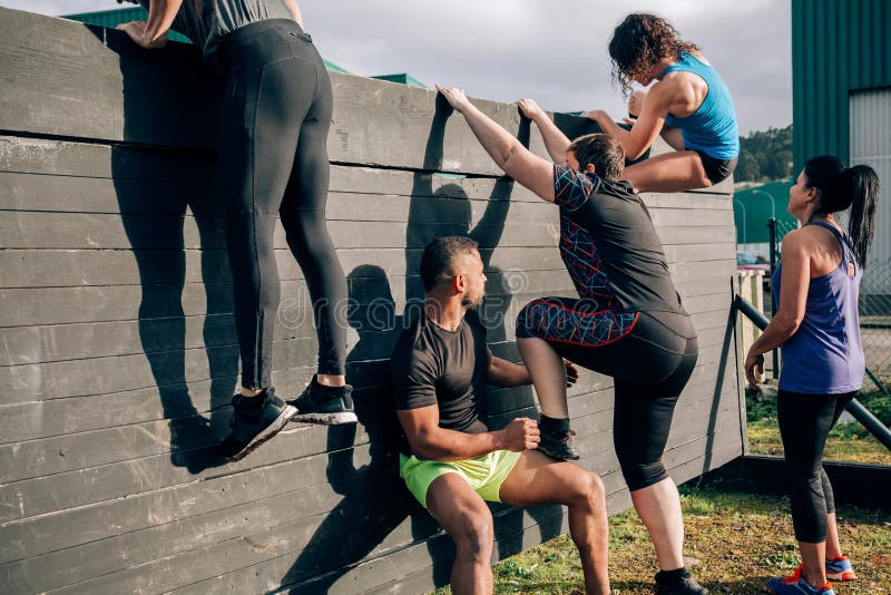 Participants in Obstacle Course Climbing Wall Stock Image - Image of ...