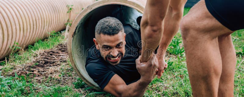 Participants Obstacle Course Going through a Pipe Stock Image - Image ...