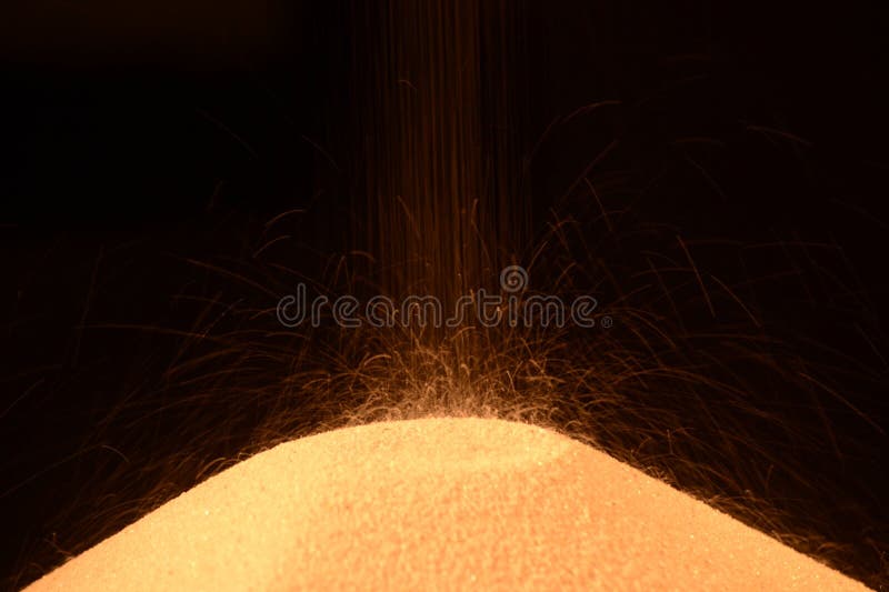 Particles Falling on the Hourglass Bounce Back Stock Image - Image of ...