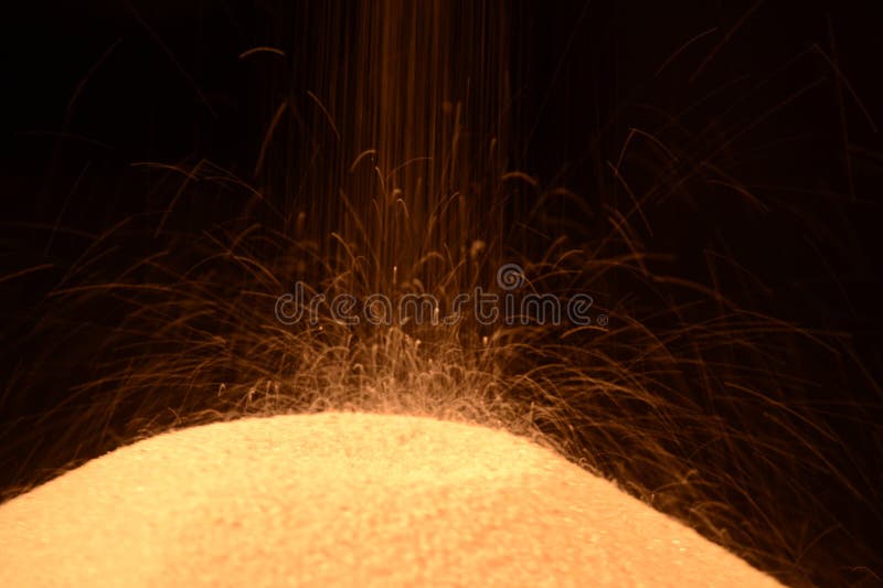 Particles Falling on the Hourglass Bounce Back Stock Image - Image of ...