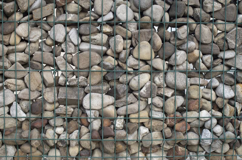 Partition Wall of Green Steel Mesh and Pebble Stock Photo - Image of ...